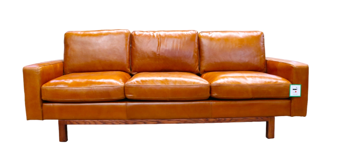 Vintage Elegance Madison's Distressed Tan Leather Sofa